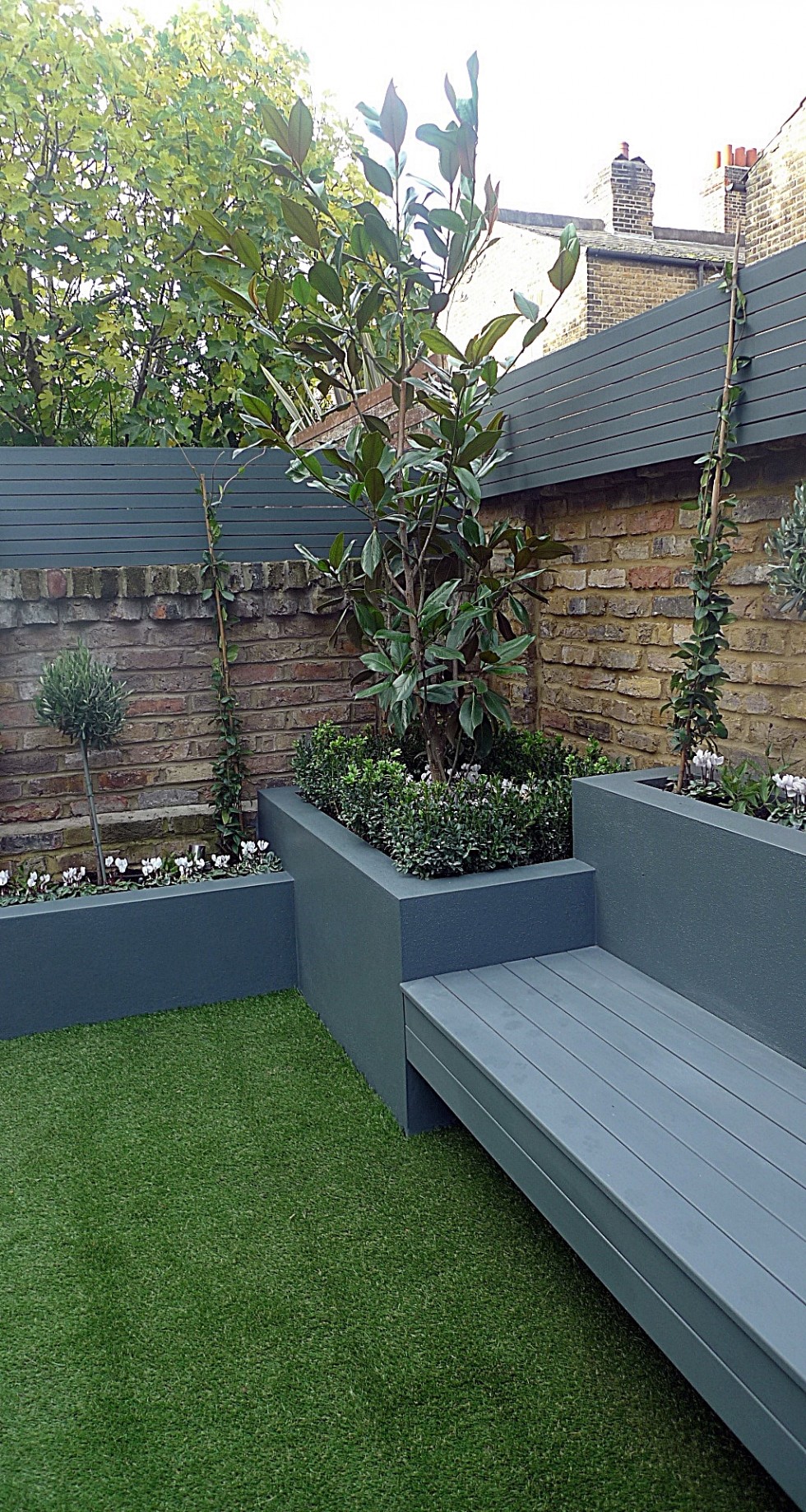 Grey colour scheme agapanthus olives artificial grass porcelain grey ...